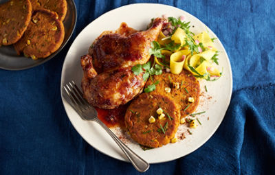 Orange Guajillo Glazed Half Chicken with Sweet Potato Corn Cakes